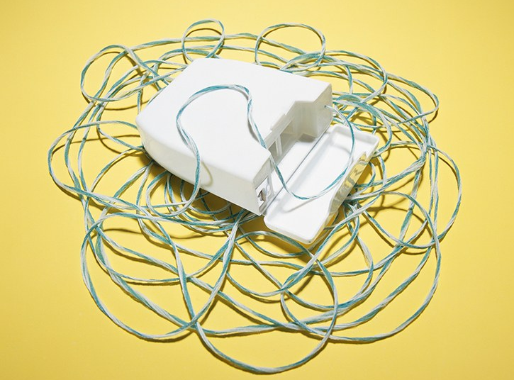 Alternatives to string floss - Dallas Prosthodontist | D. Greg Seal, D.D.S.